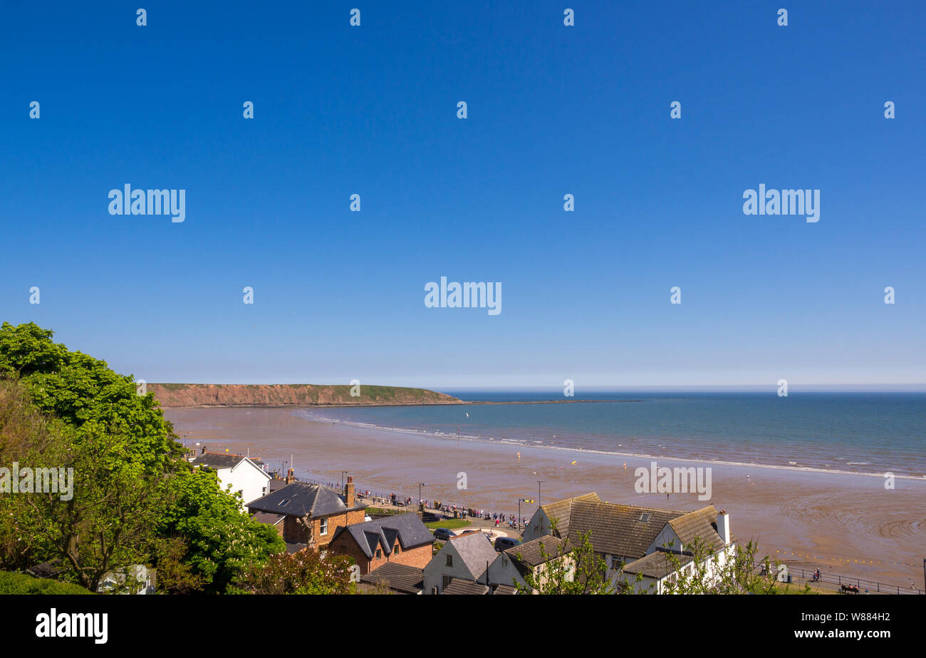 Filey beach and view towards Filey Brigg, North Yorkshire, UK Stock ...