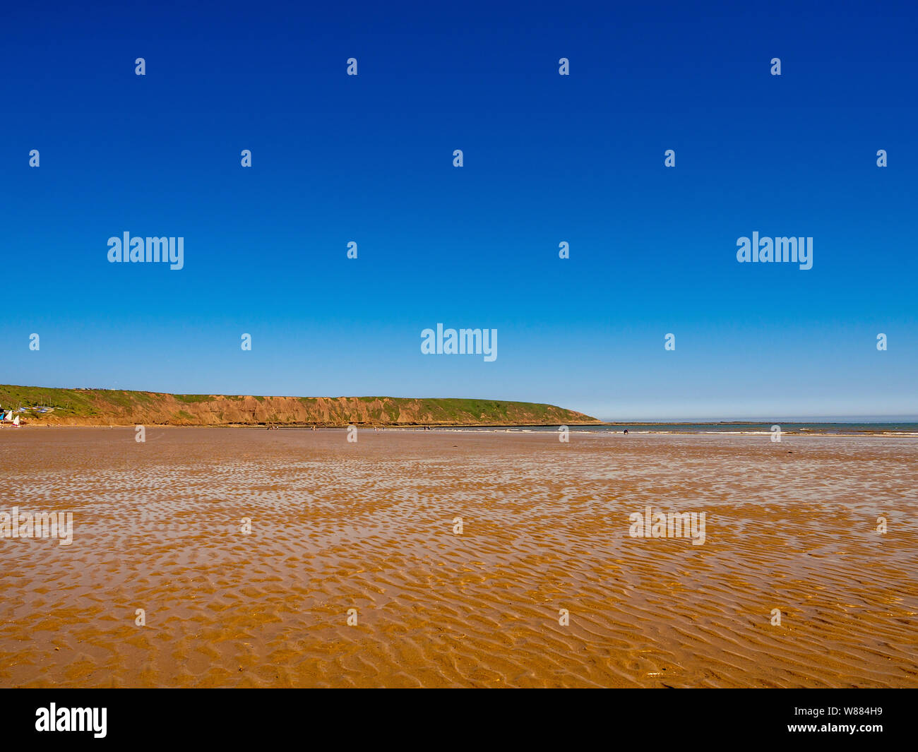 Filey beach and view towards Filey Brigg, North Yorkshire, UK Stock ...