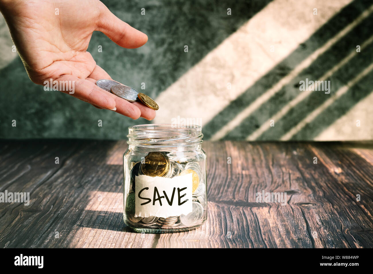 Save money business woman hi-res stock photography and images - Alamy