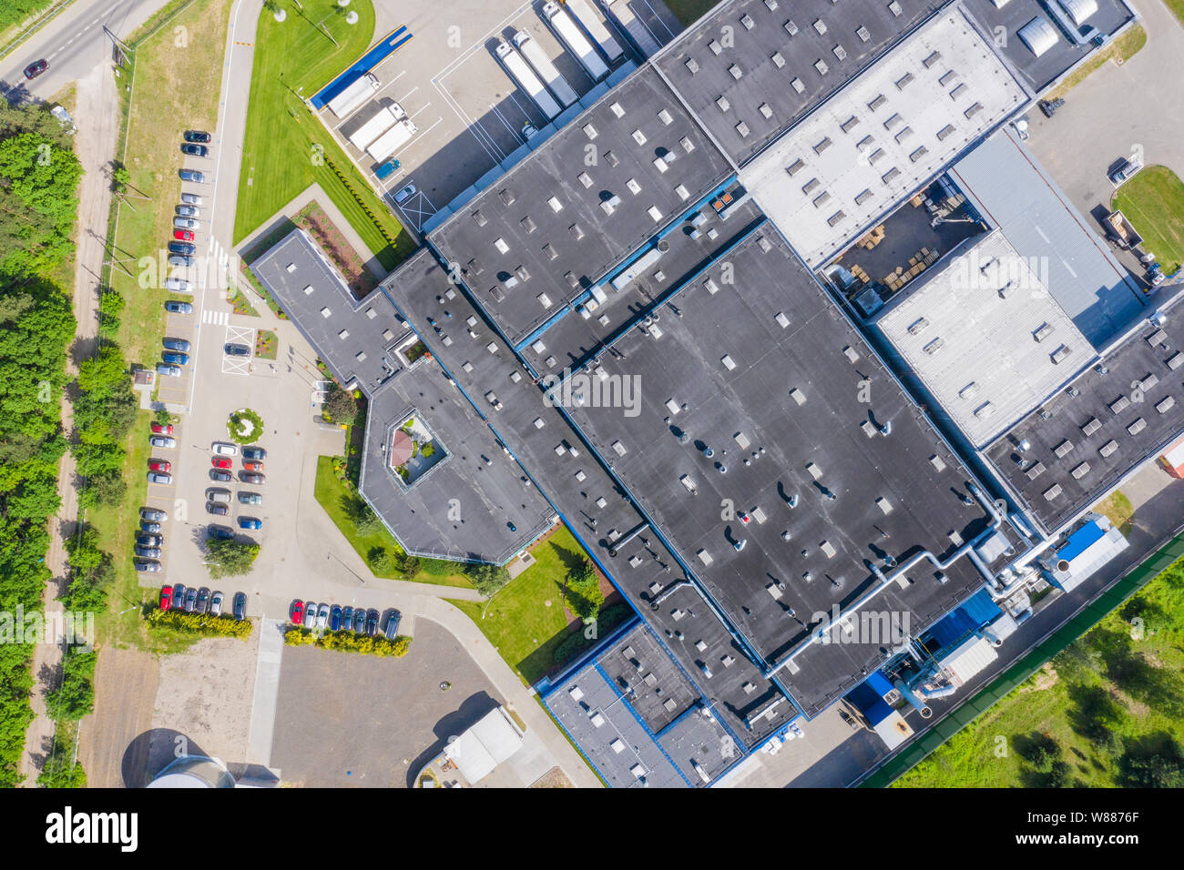 Aerial Shot of Industrial Loading Area where Many Trucks Are Unloading ...