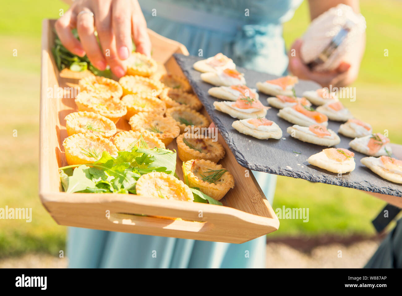 Waitress serving canapes hi-res stock photography and images - Alamy