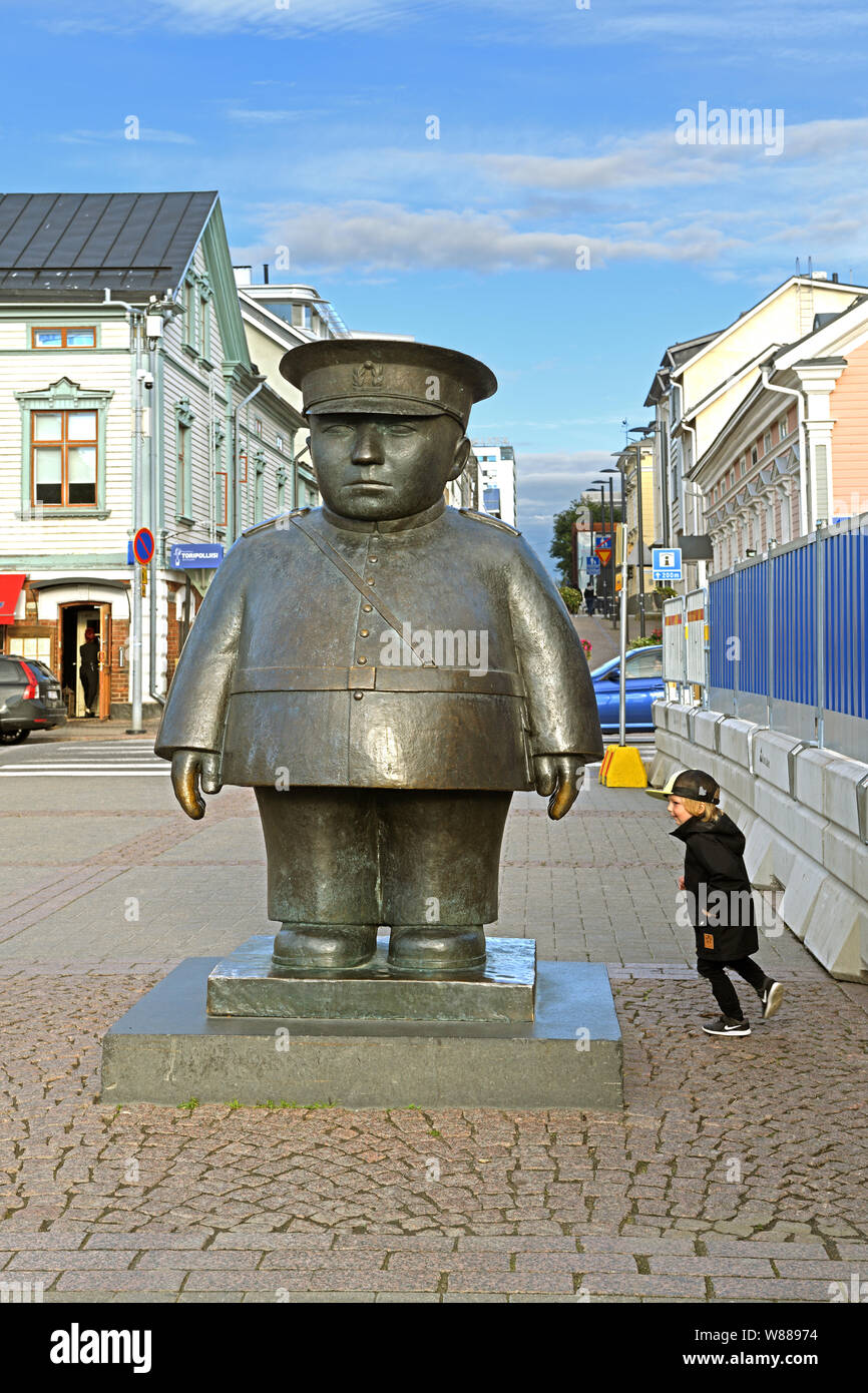Statue of policeman Bobby on market square in center of Oulu Stock ...