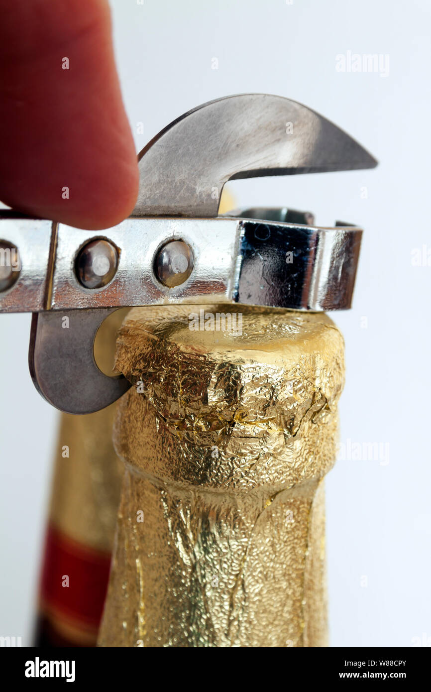 Opening bottles with beer Stock Photo - Alamy