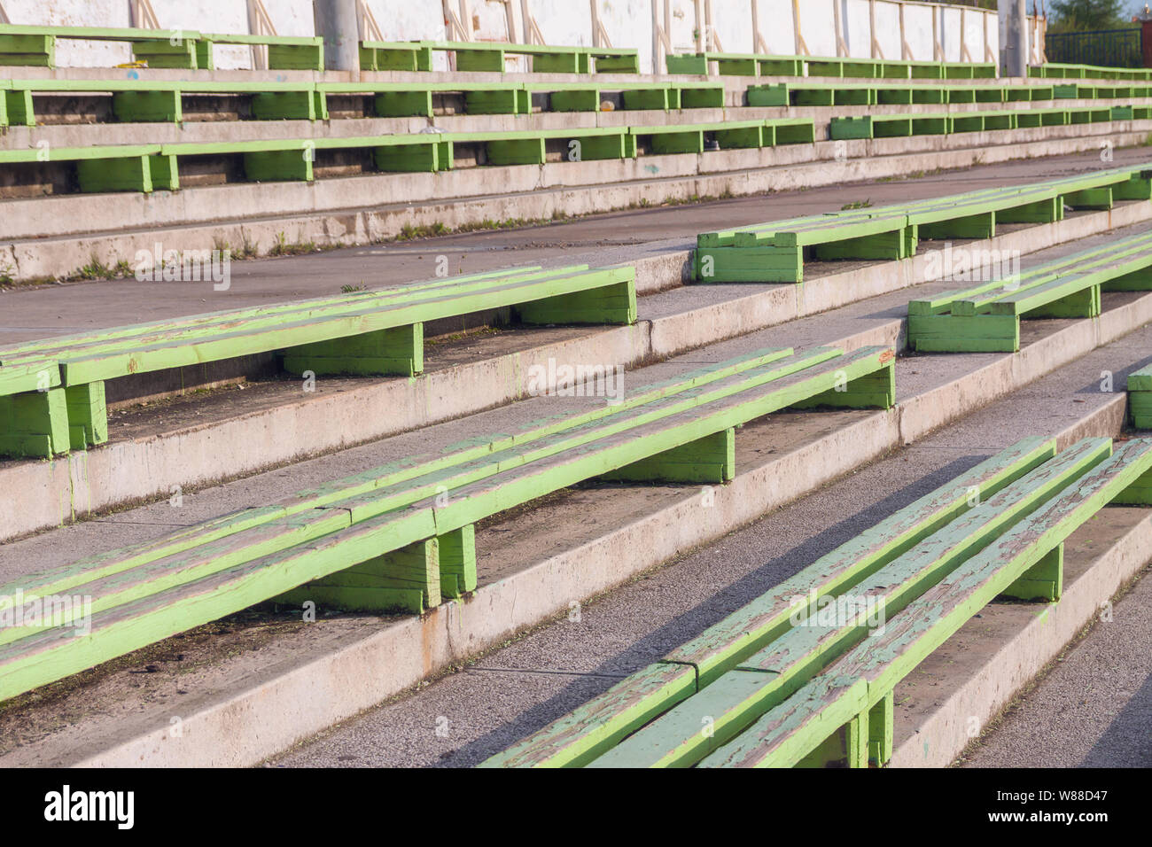 Old benches at the stadium Stock Photo - Alamy