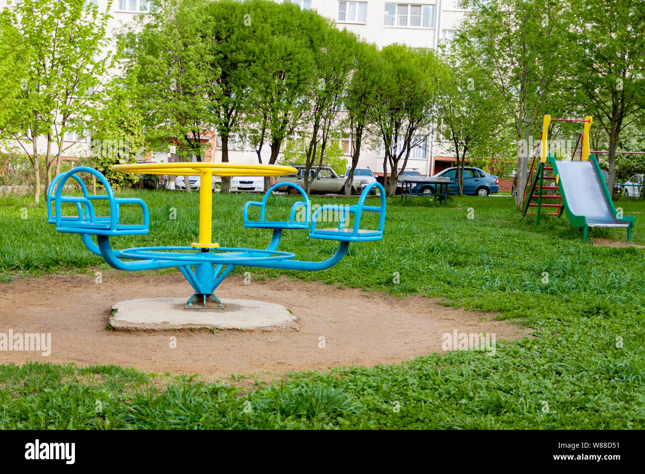 Carousel on Children's playground Stock Photo - Alamy
