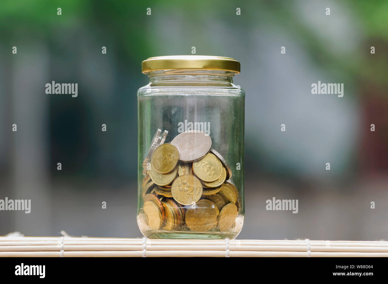 Coins In Bottle High Resolution Stock Photography and Images - Alamy