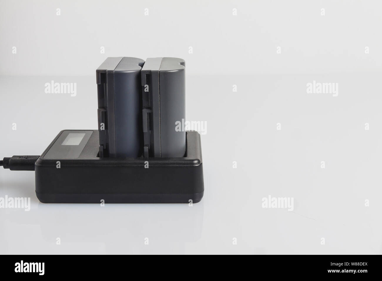 Charge the battery for the camera Stock Photo - Alamy