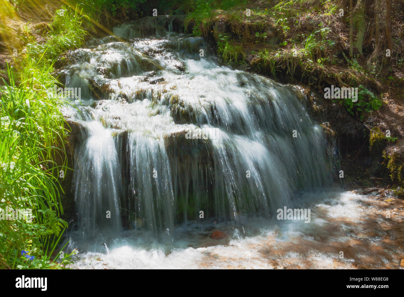 A small waterfall Stock Photo - Alamy