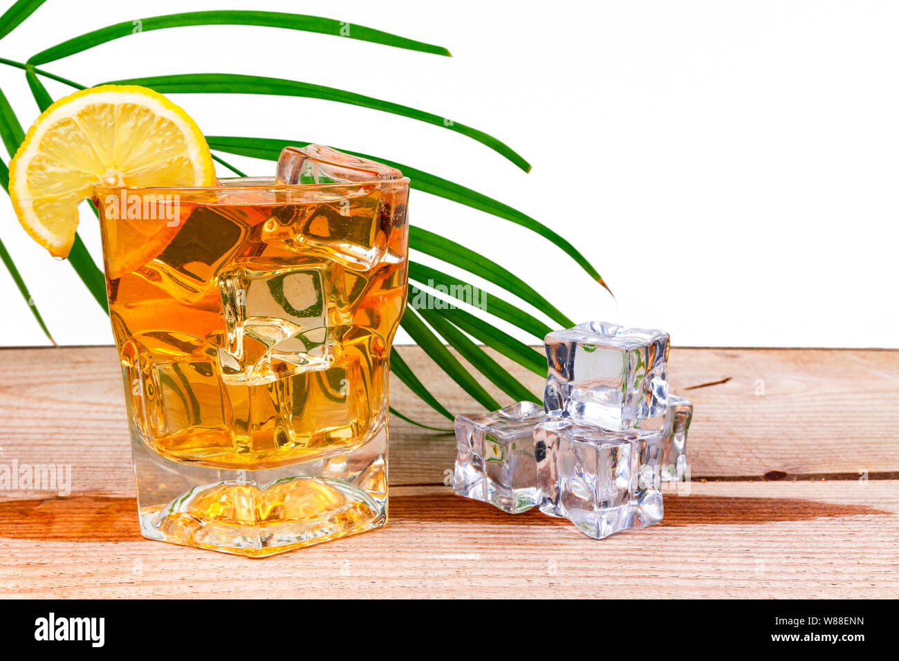 Lemonade in the grocery next to ice cubes Stock Photo - Alamy