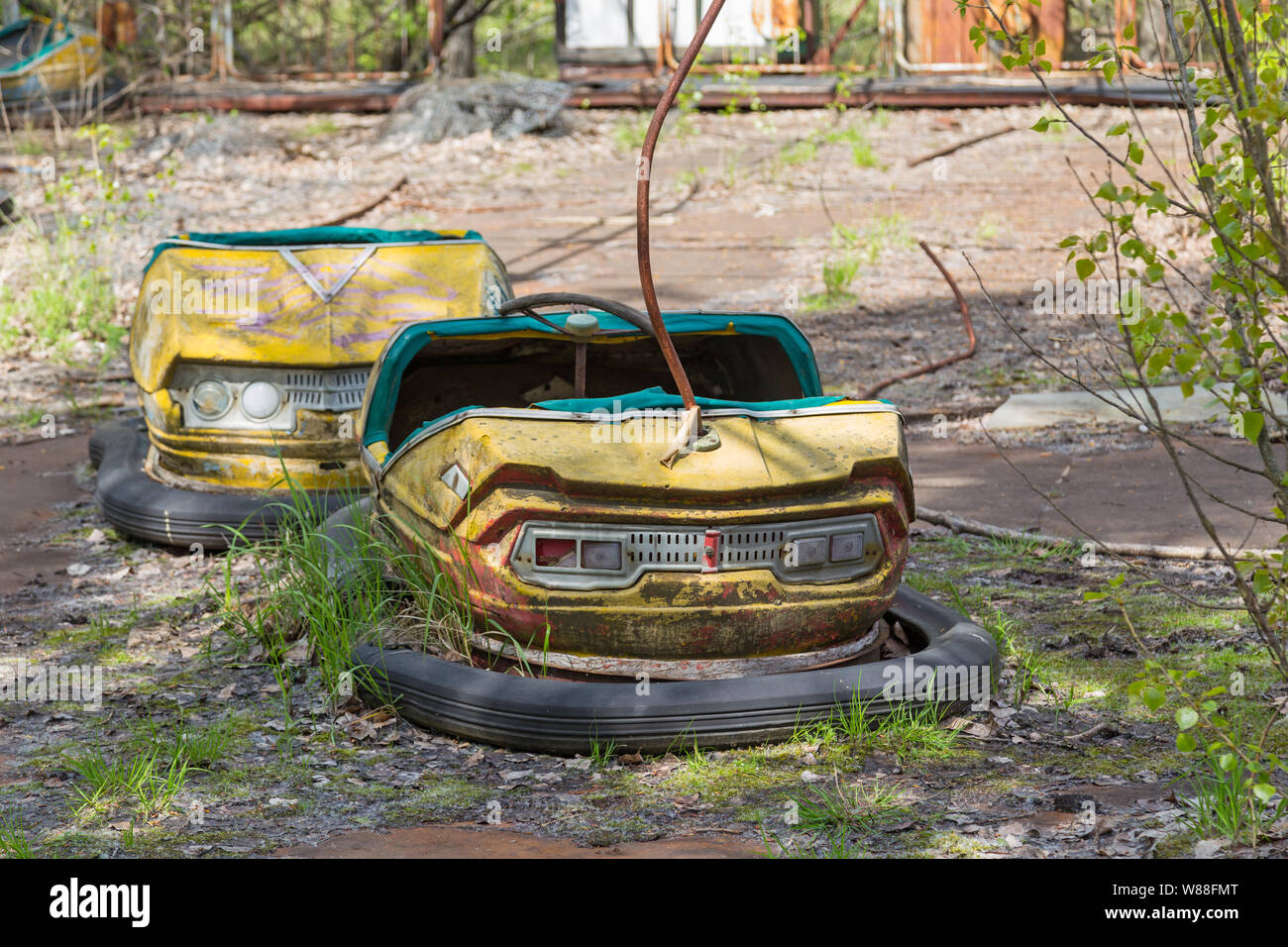 Old broken rusty metal radioactive children's electric cars abandoned ...