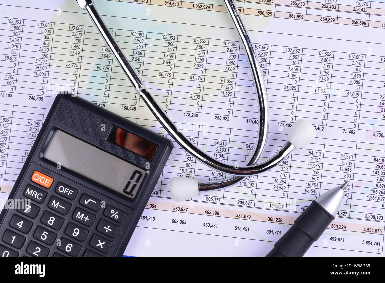 Health care costs. Stethoscope and calculator symbol for health care ...