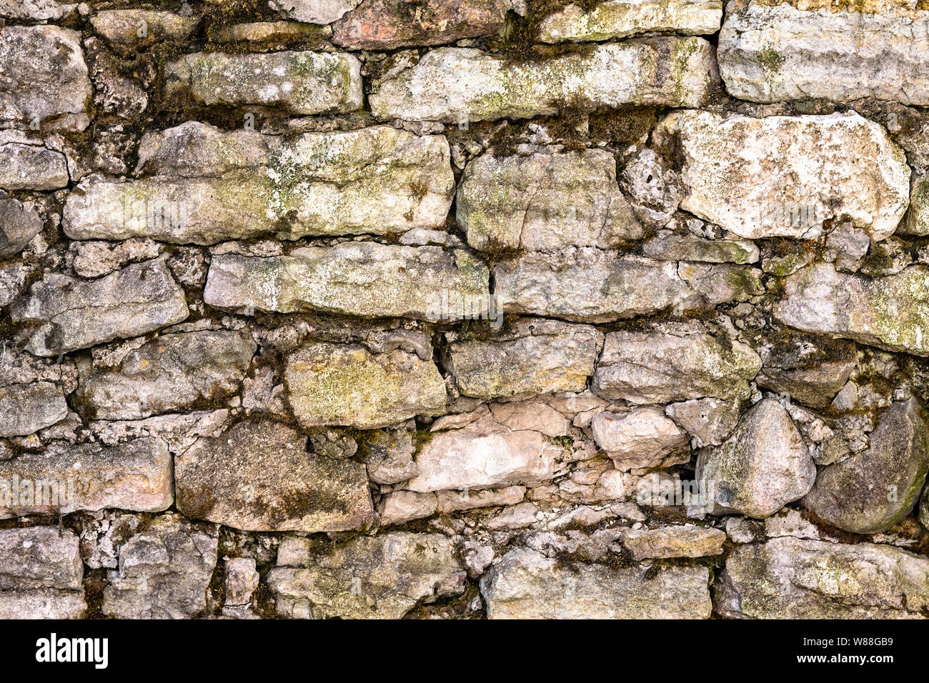 Ancient foundation stone. Background Stock Photo - Alamy