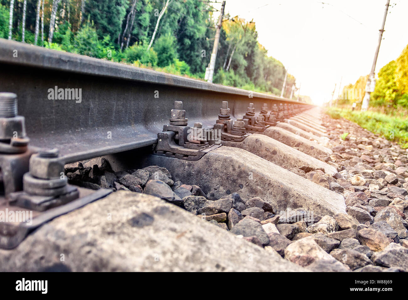 Old rust bolts for mounting rails on railroad track. Reliability of ...