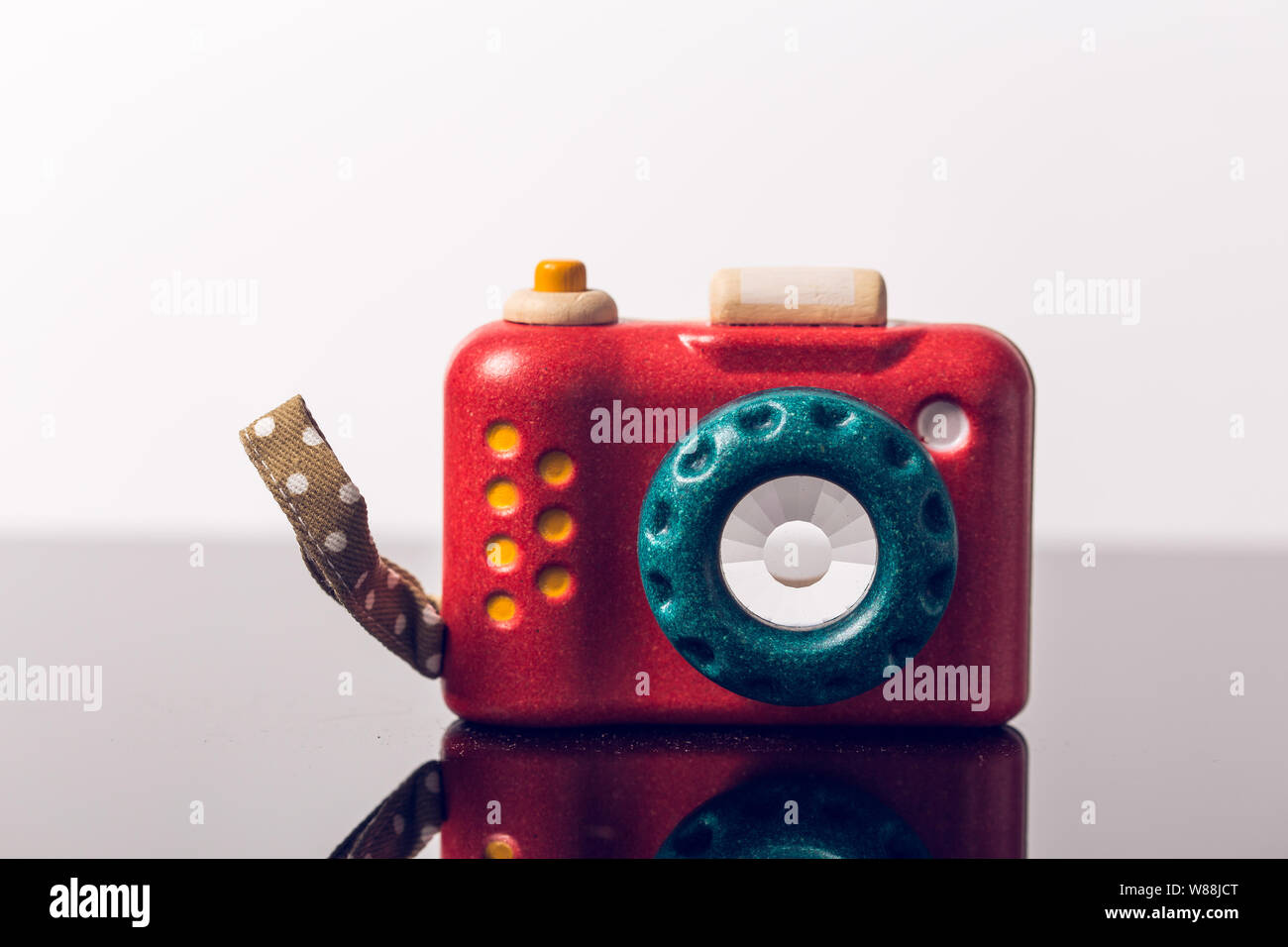 Red toy handmade wooden photography camera Stock Photo - Alamy