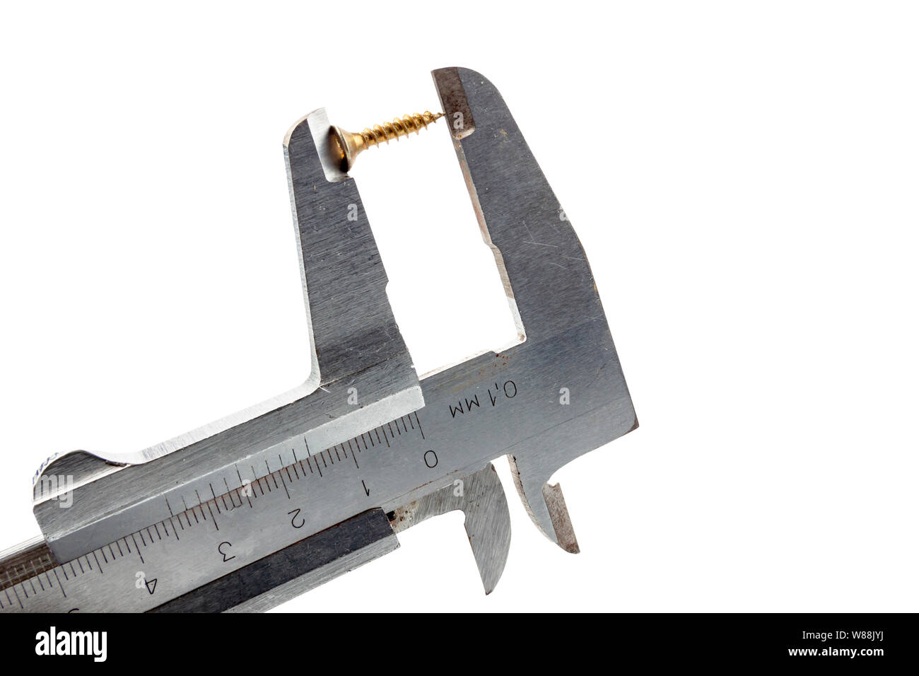 Old caliper measures screw on a light background Stock Photo - Alamy