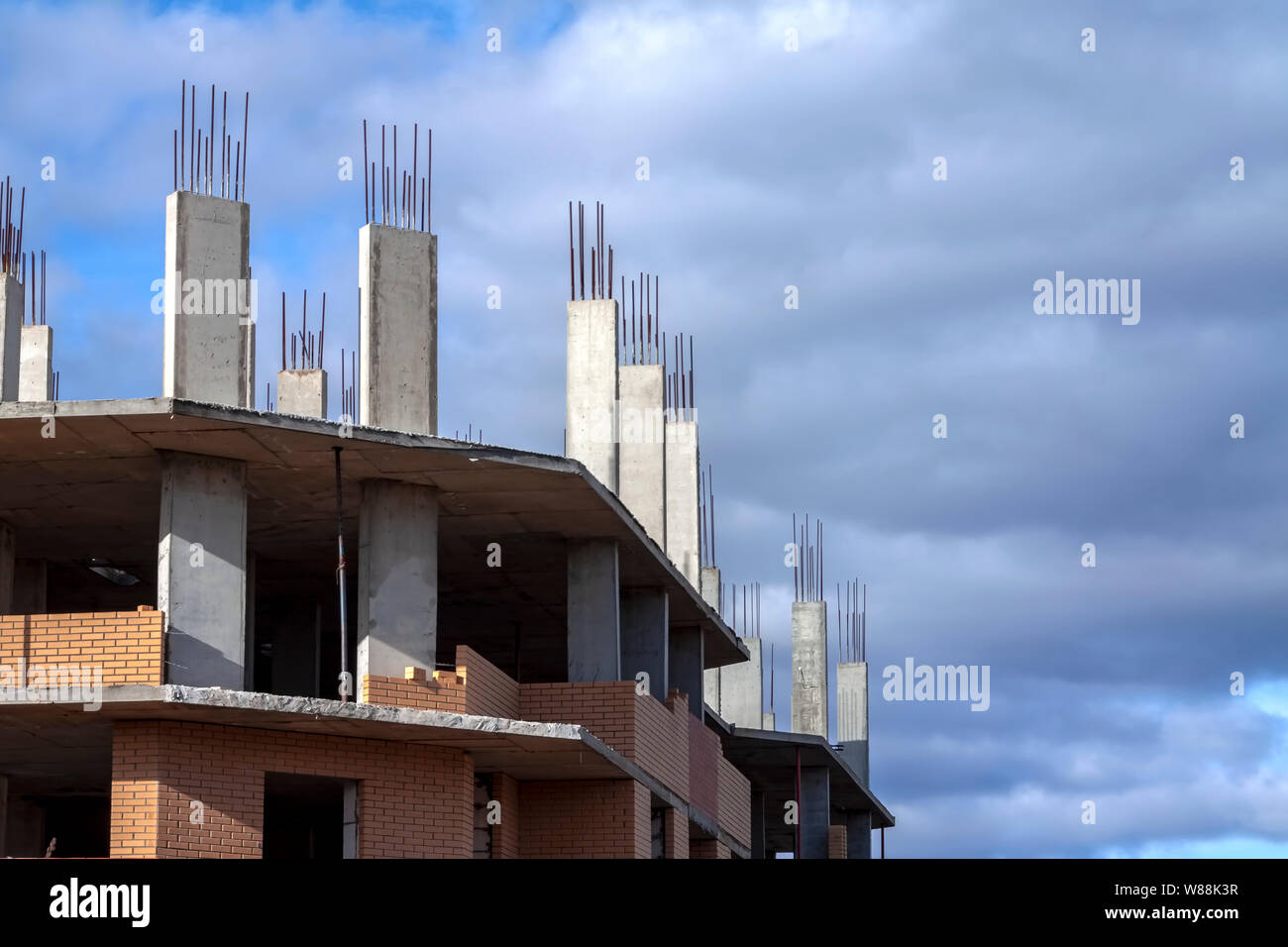 Construction of a new multi-storey residential building Stock Photo - Alamy
