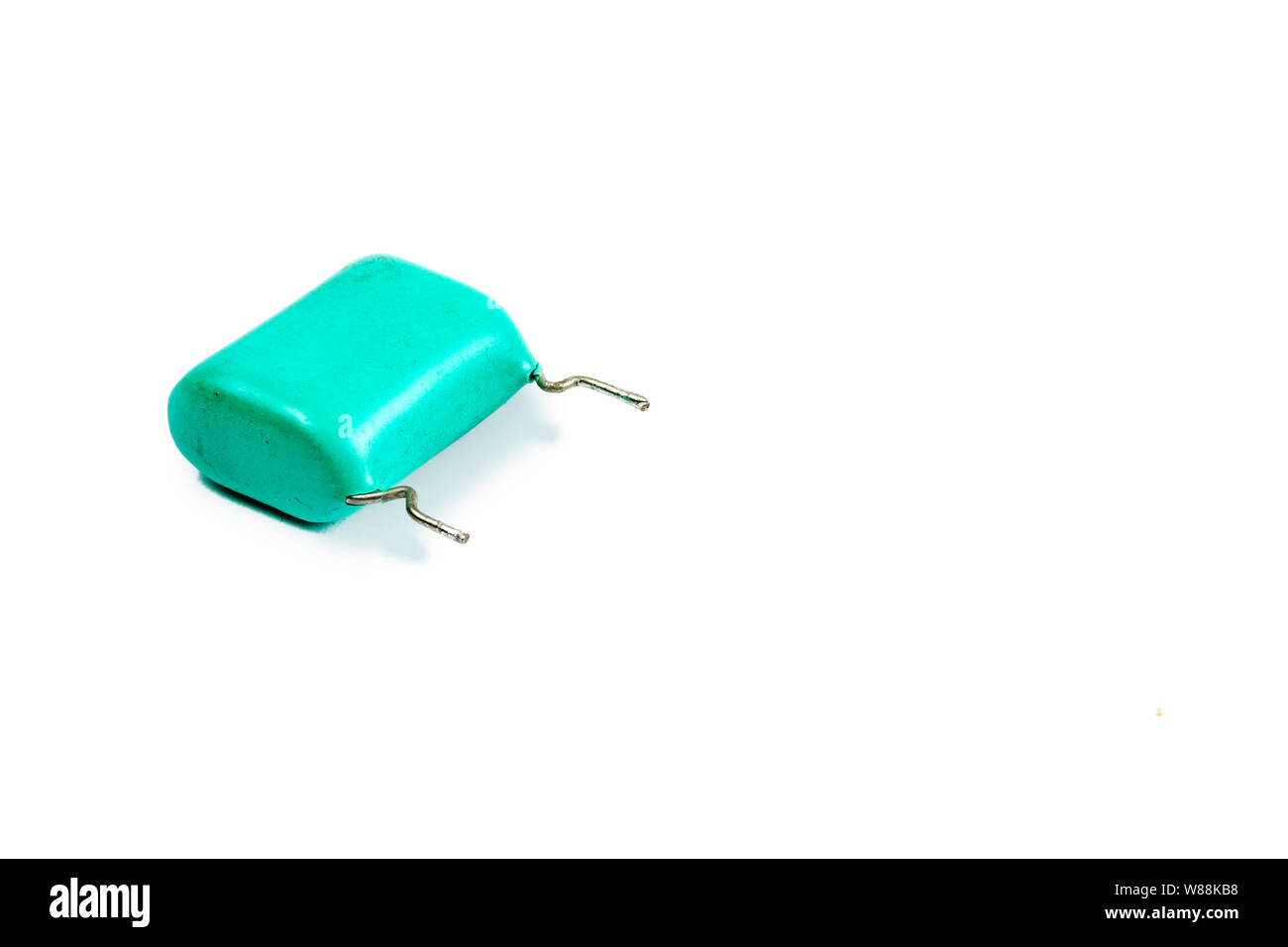 The old capacitor on a white background Stock Photo - Alamy