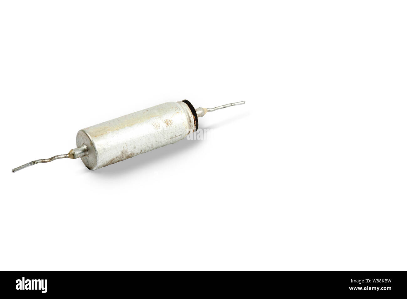 The old capacitor on a white background Stock Photo - Alamy