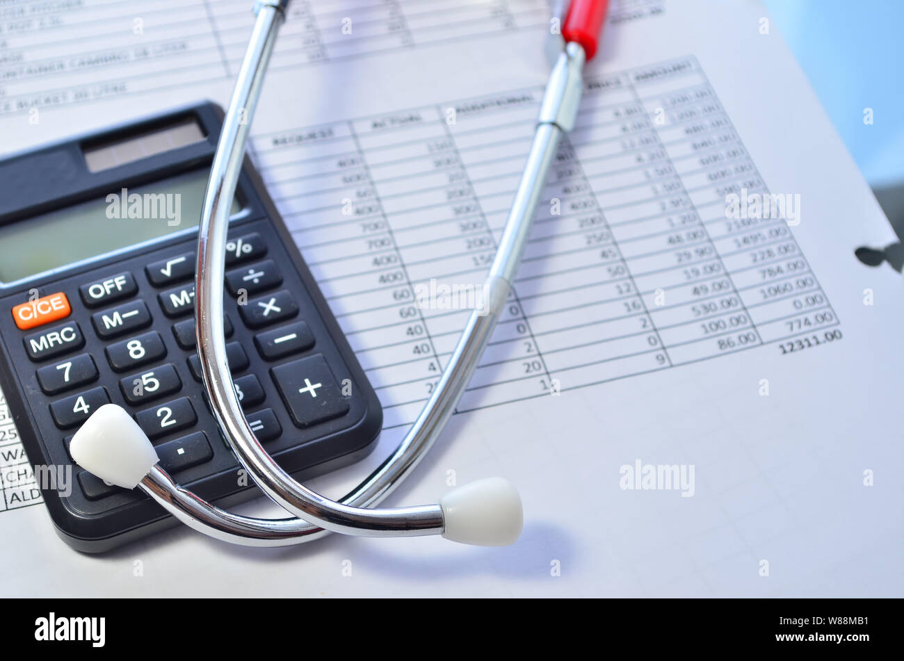Health care costs. Stethoscope and calculator symbol for health care ...