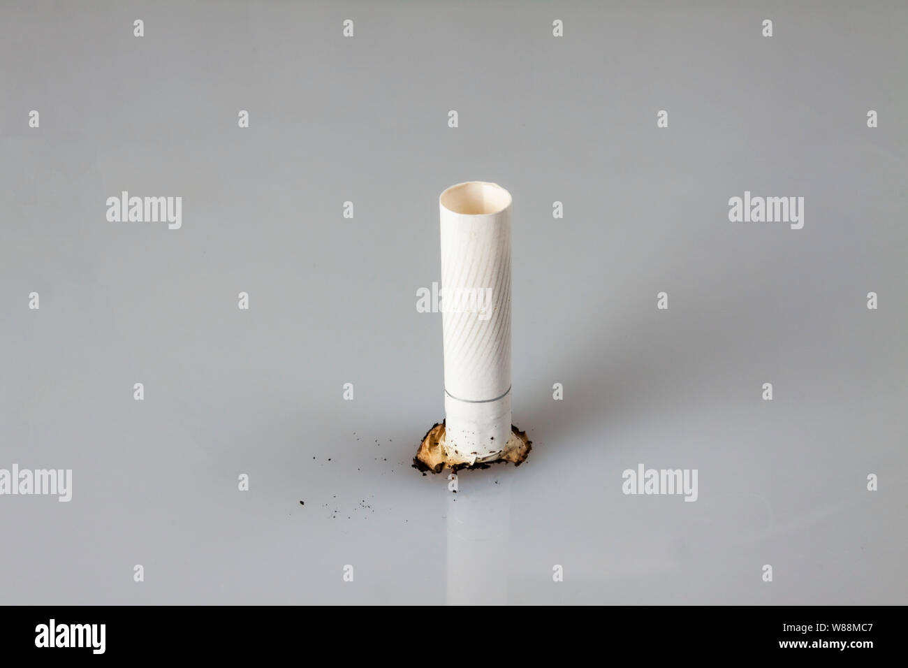 The concept of a healthy lifestyle. A small stub stands on a light ...