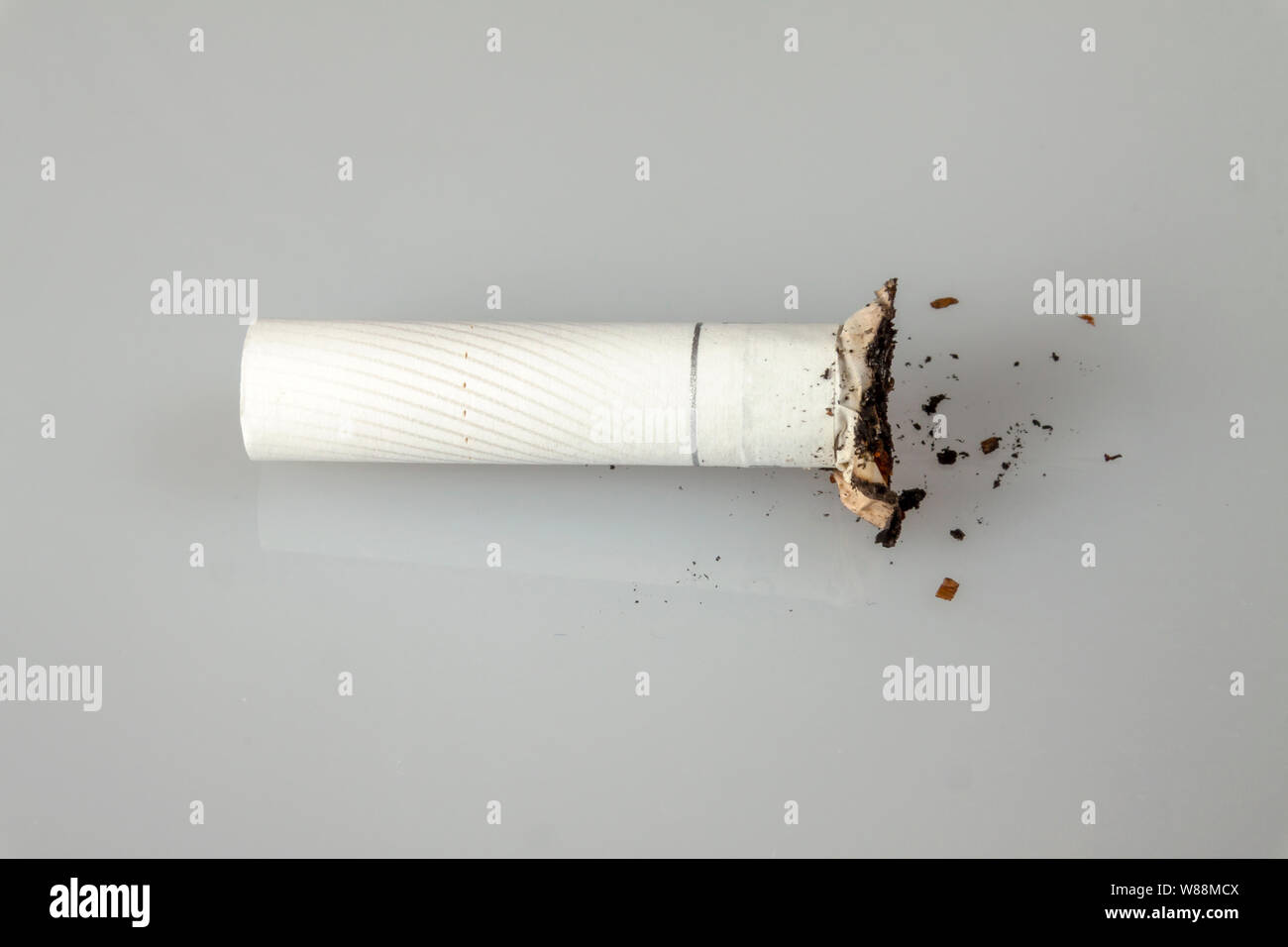 Healthy lifestyle concept. A small stub lies on a light surface, a row ...