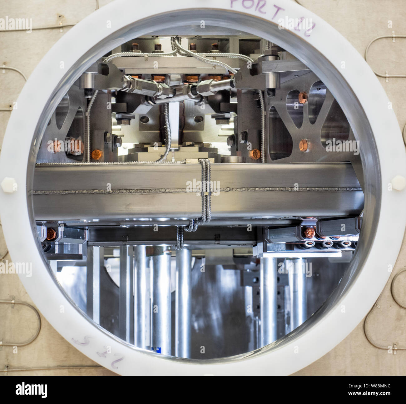 View through a port of the vacuum vessel during construction of the ...