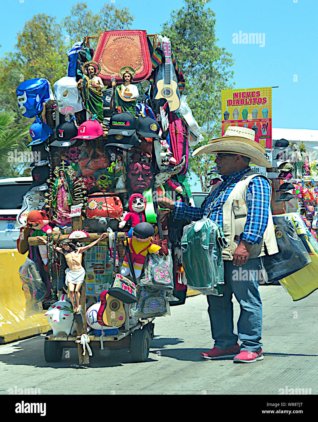 Vendor at US Mexican border crossing Stock Photo - Alamy
