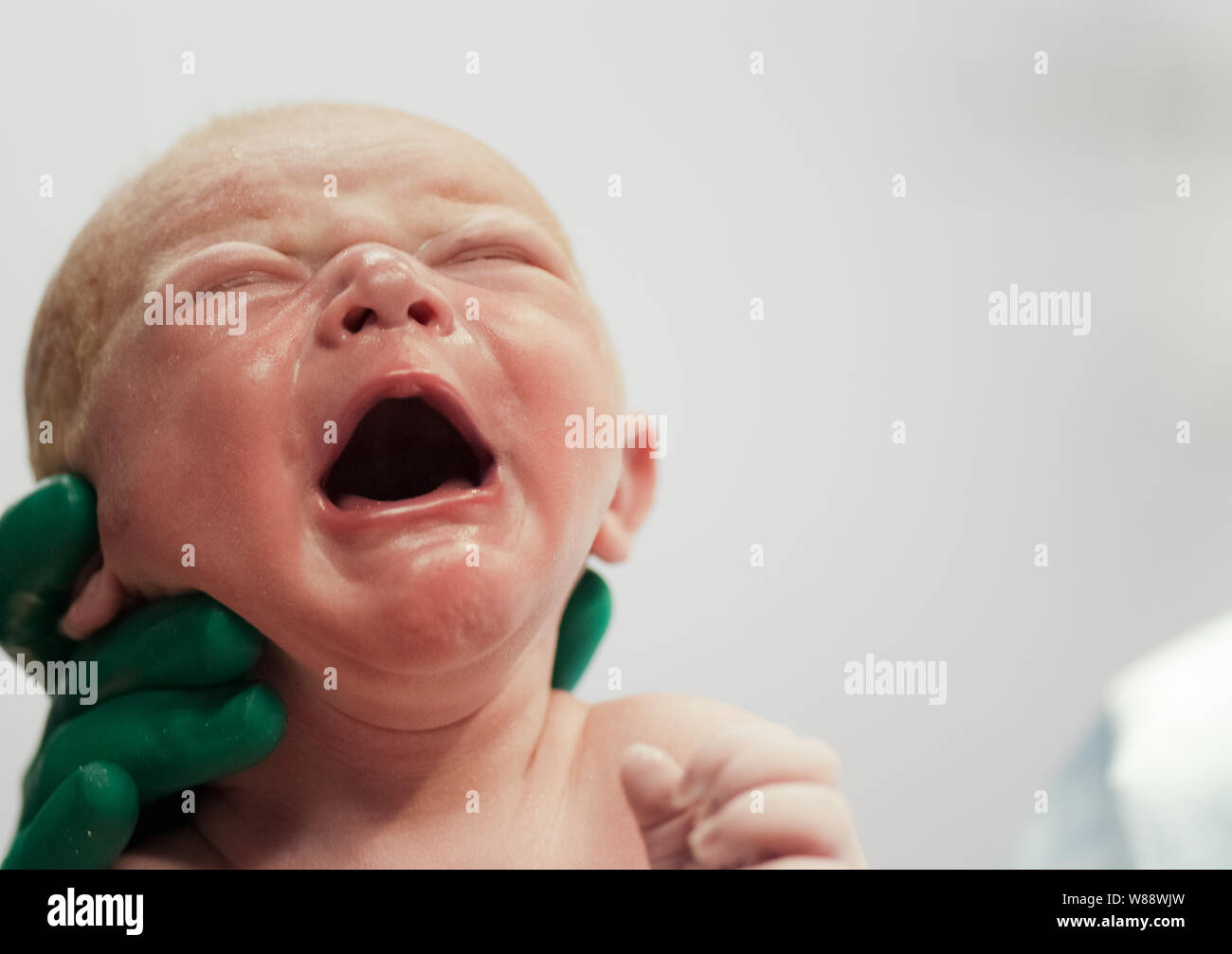 Newborn directly after birth with mother Stock Photo - Alamy