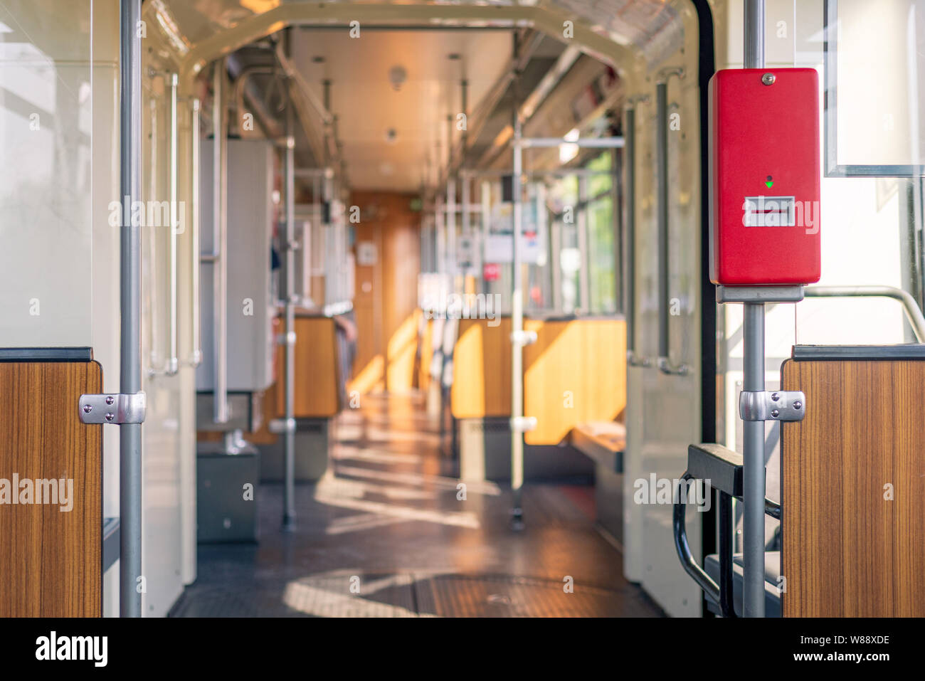 Selected focus of Red public transportation ticket stamp or validation ...