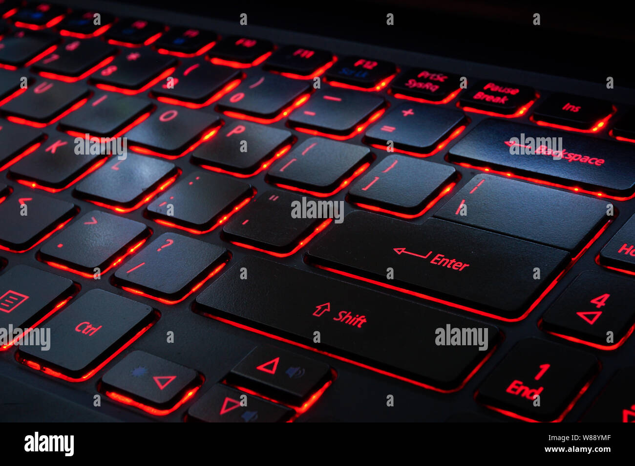 Keyboard with red back light Stock Photo - Alamy