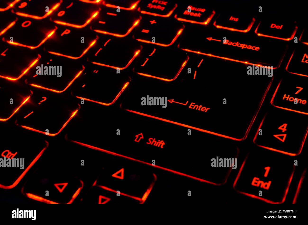 Keyboard with red back light Stock Photo - Alamy