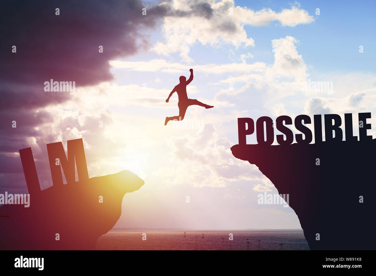 Silhouette man jumping over cliff hi-res stock photography and images ...