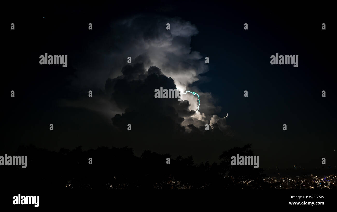 A real lightnings in the sky at night. Powerful and several lightning ...