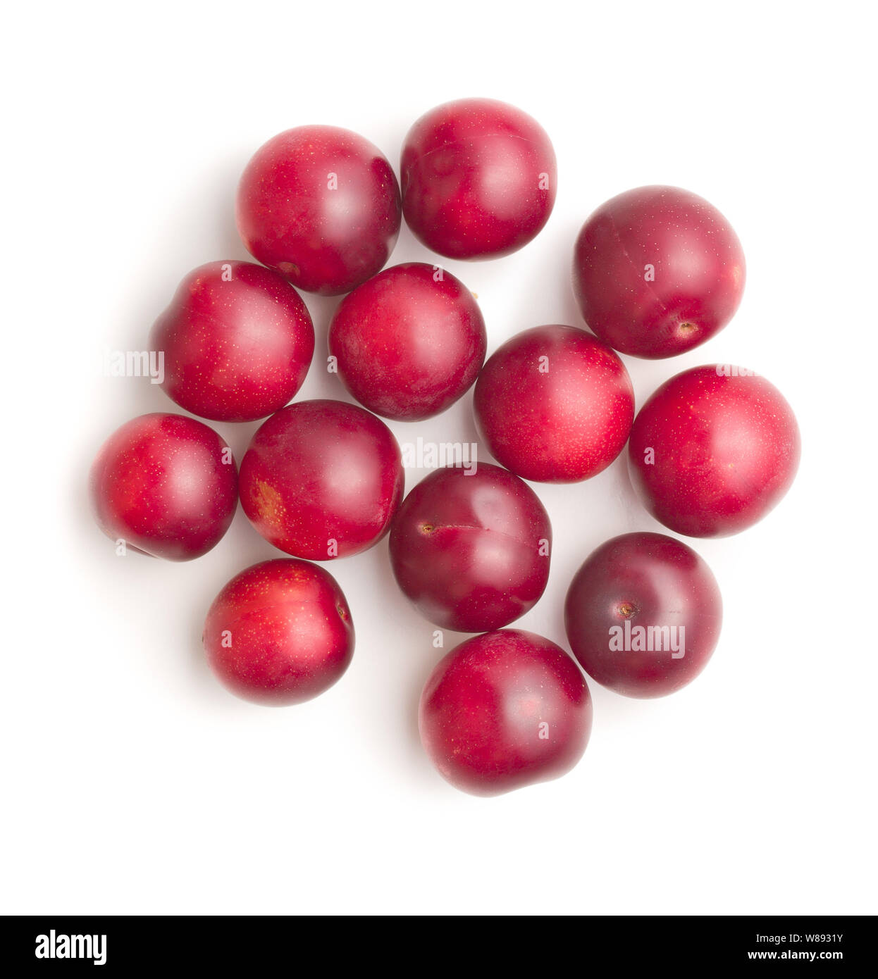 The red cherry plums fruit isolated on white background Stock Photo - Alamy