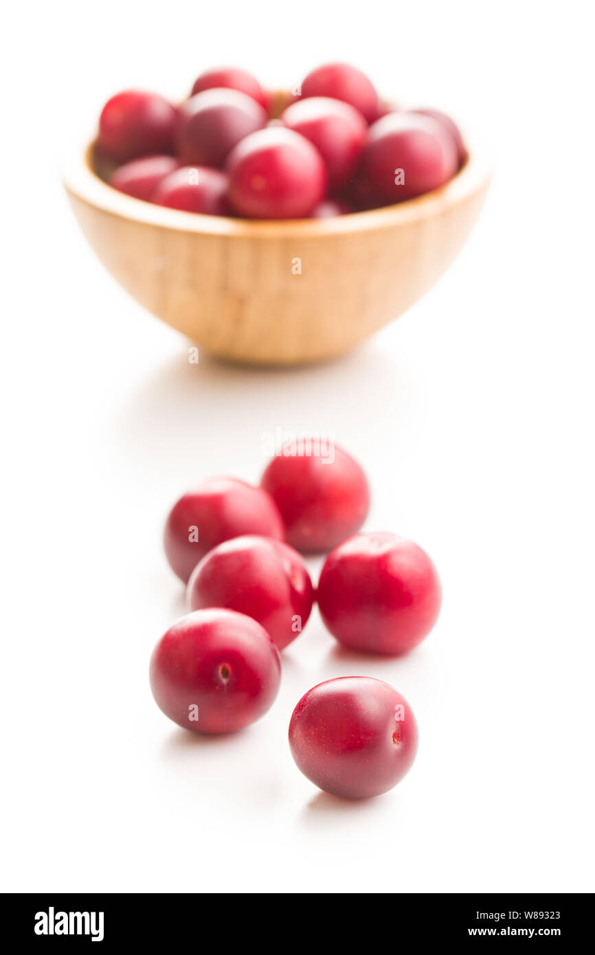 The red cherry plums fruit isolated on white background Stock Photo - Alamy