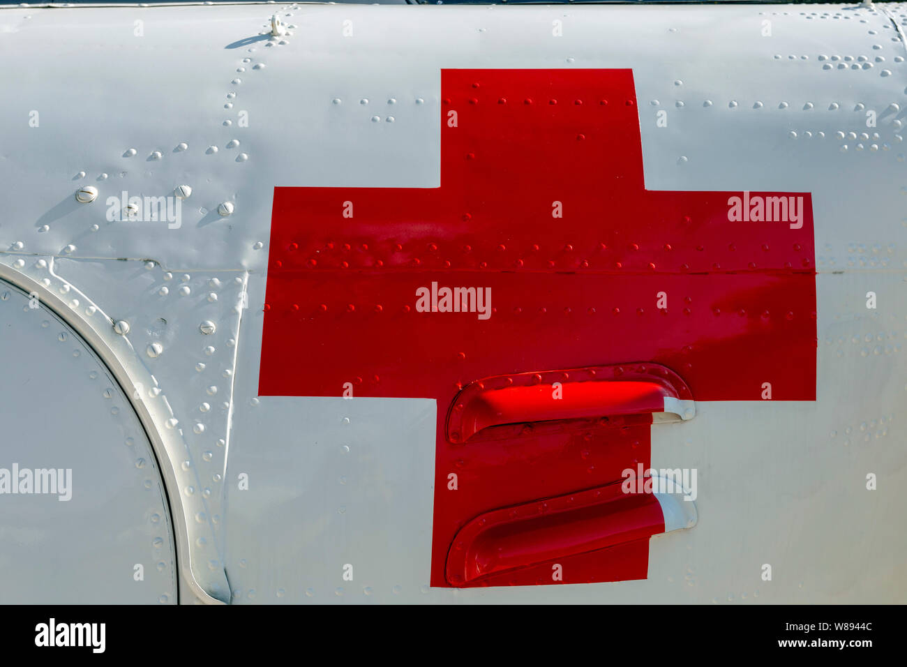 Red cross on an old russian ambulance helicopter Stock Photo - Alamy