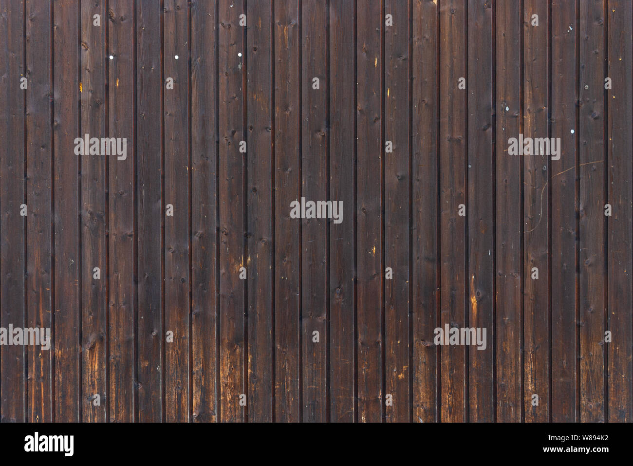 Dark brown vertical pattern rough old bumpy vintage wooden texture wall ...