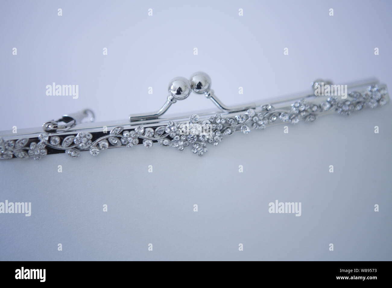 Silver satin clutch hi-res stock photography and images - Alamy