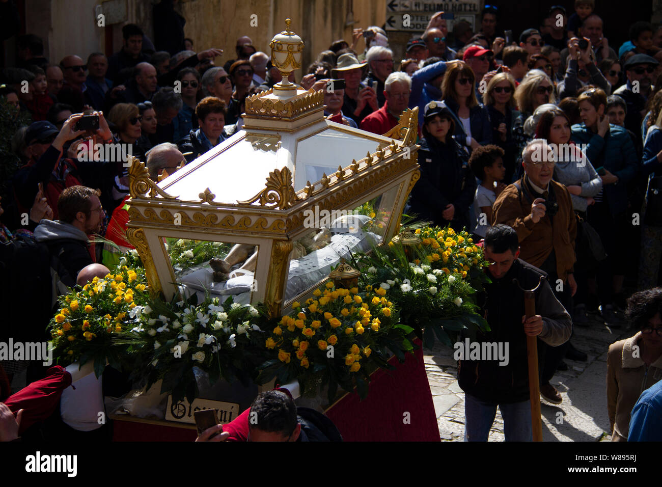 Good Friday Procession in Erice Sicily Italy with statue and onlookers ...