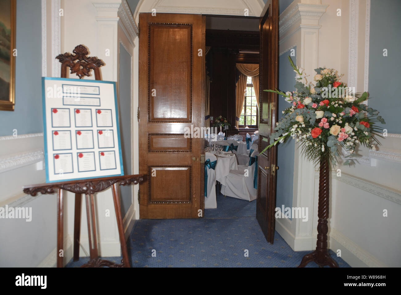 Entrance to Wedding Breakfast - Table Plan and Floral Decorations Stock ...