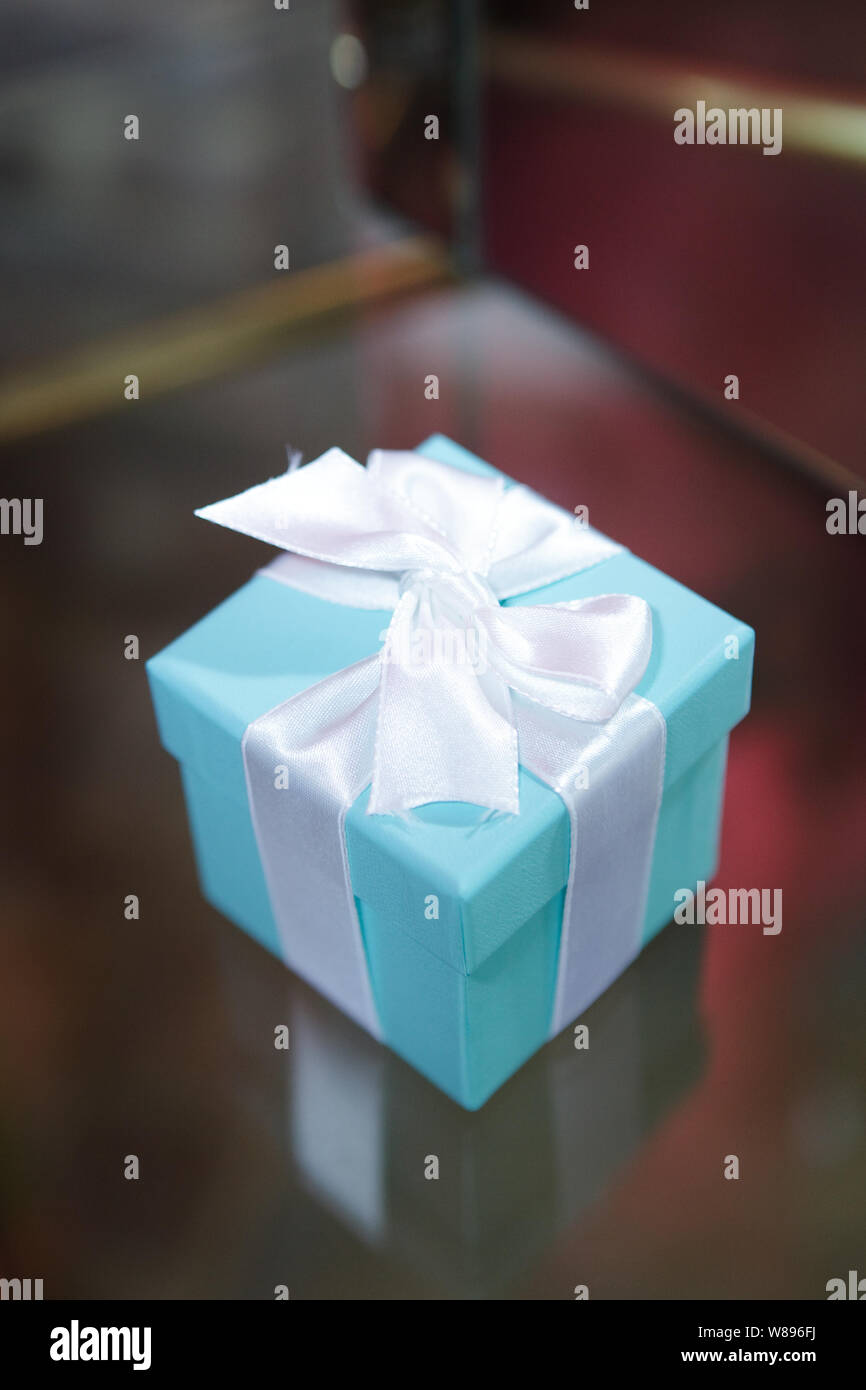 Tiffany & Co Blue Box with White Ribbon Stock Photo - Alamy