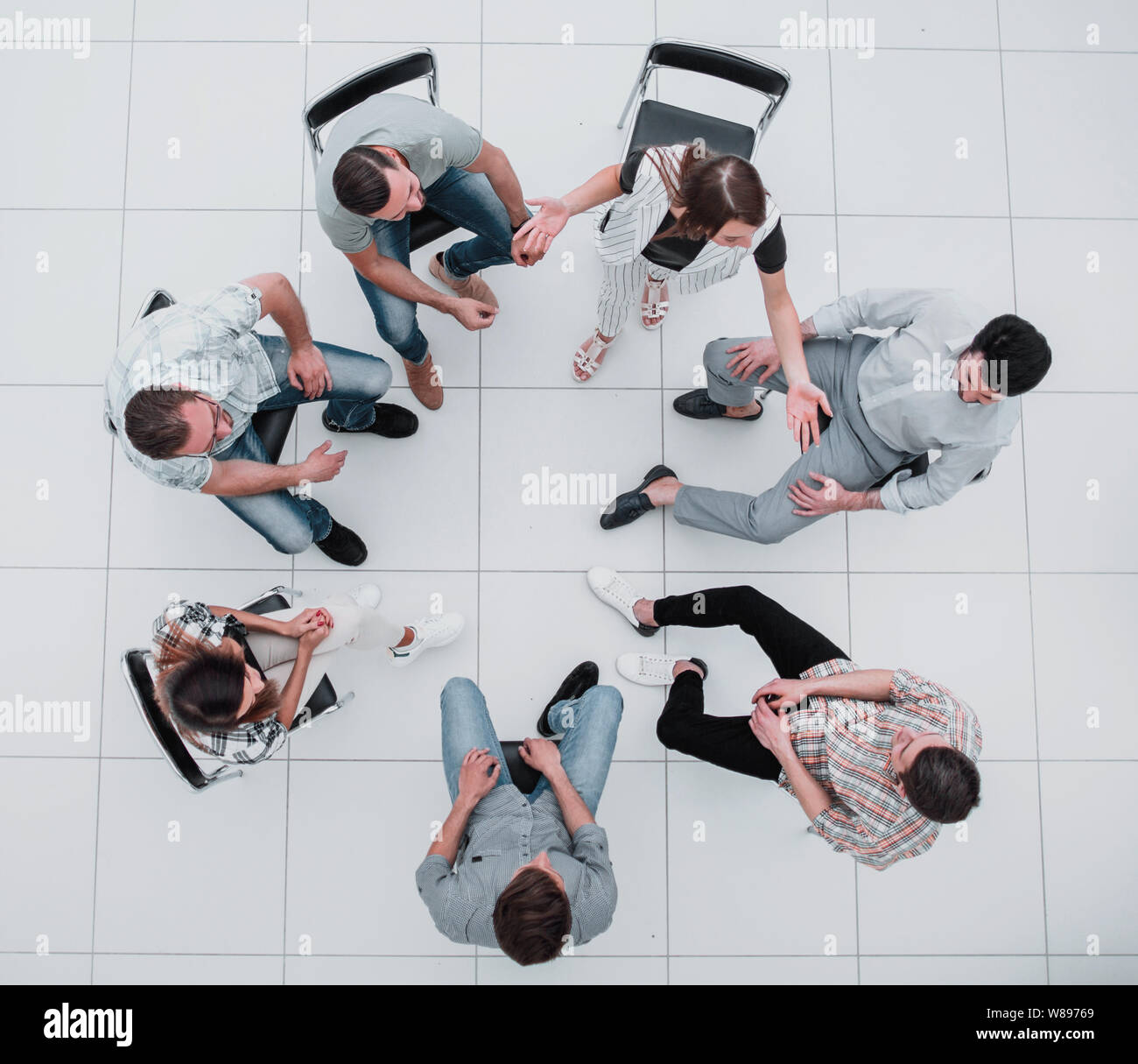 top view. a team of successful young employees Stock Photo - Alamy