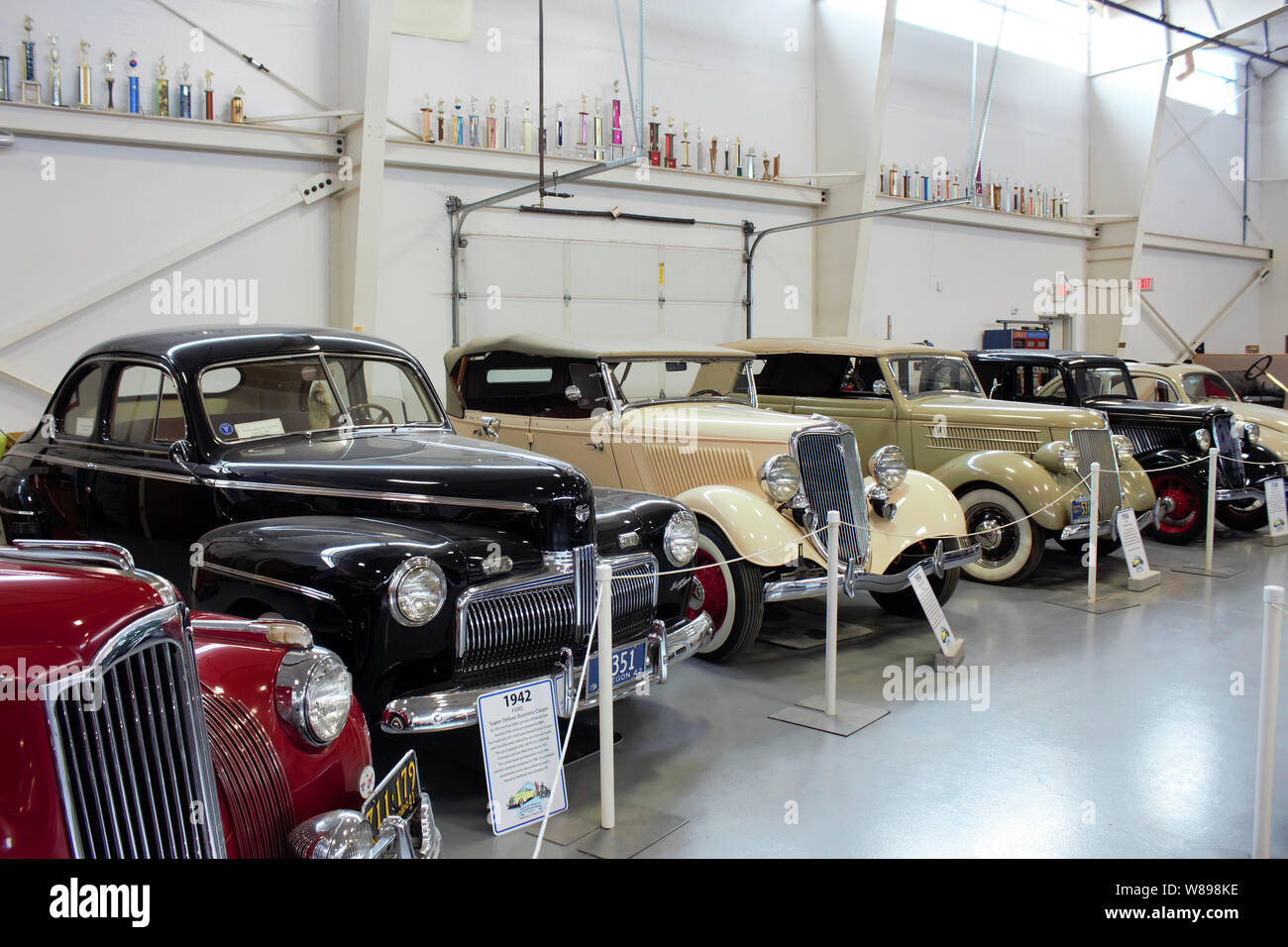A row of rebuilt antique cars on display Stock Photo - Alamy