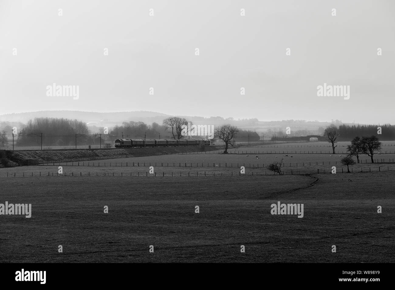 The British royal train on the West Coast mainline in Cumbria hauled by ...