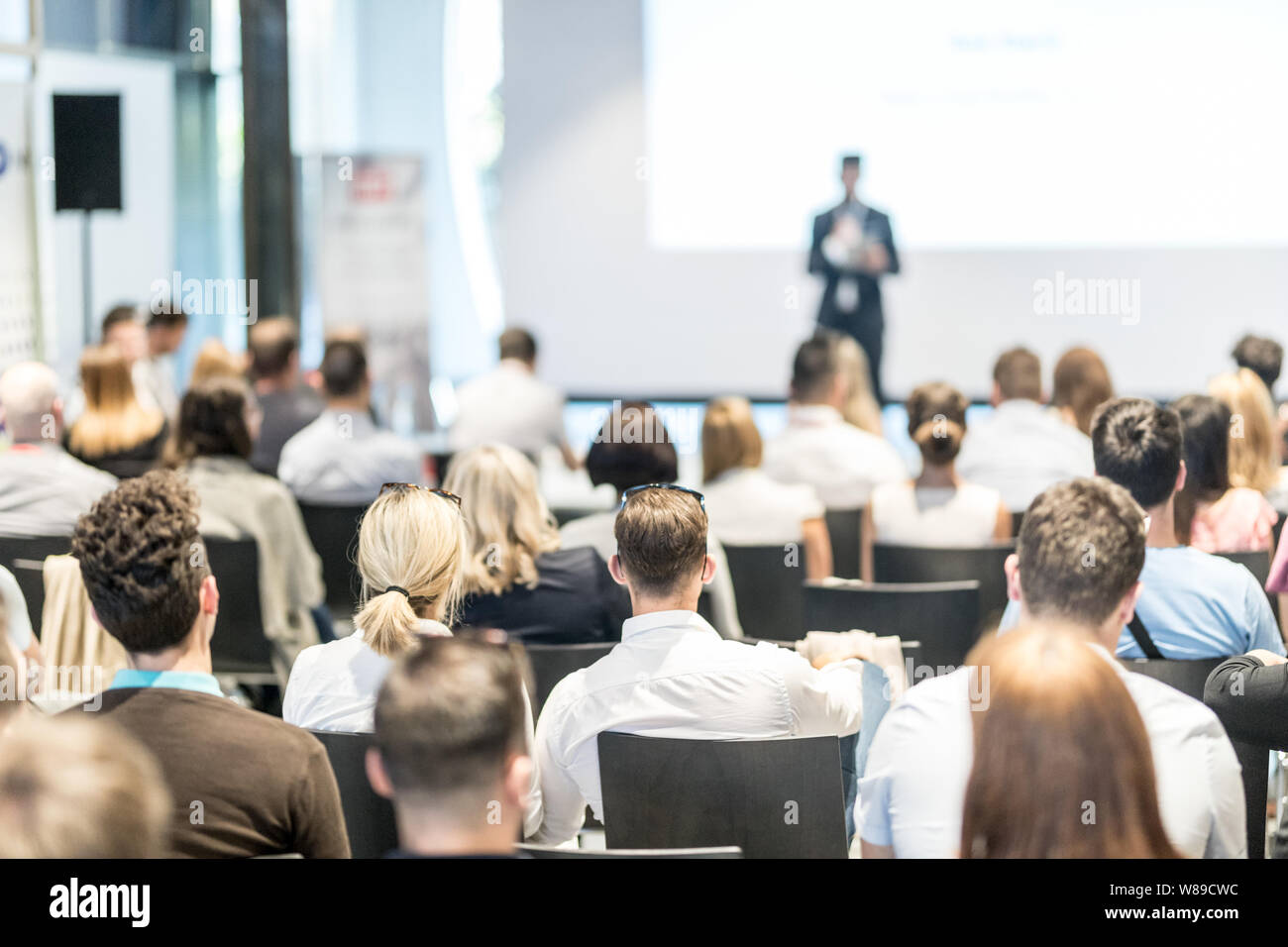 Male business speaker giving a talk at business conference event Stock ...