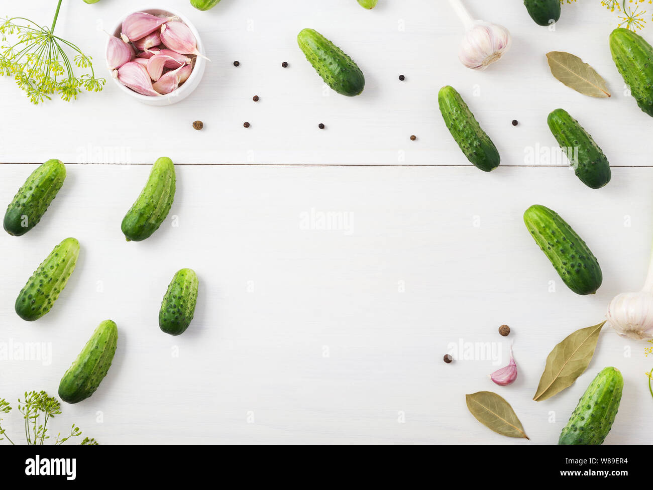 Creative flat lay layout made of cucumbers and spices for preservation ...