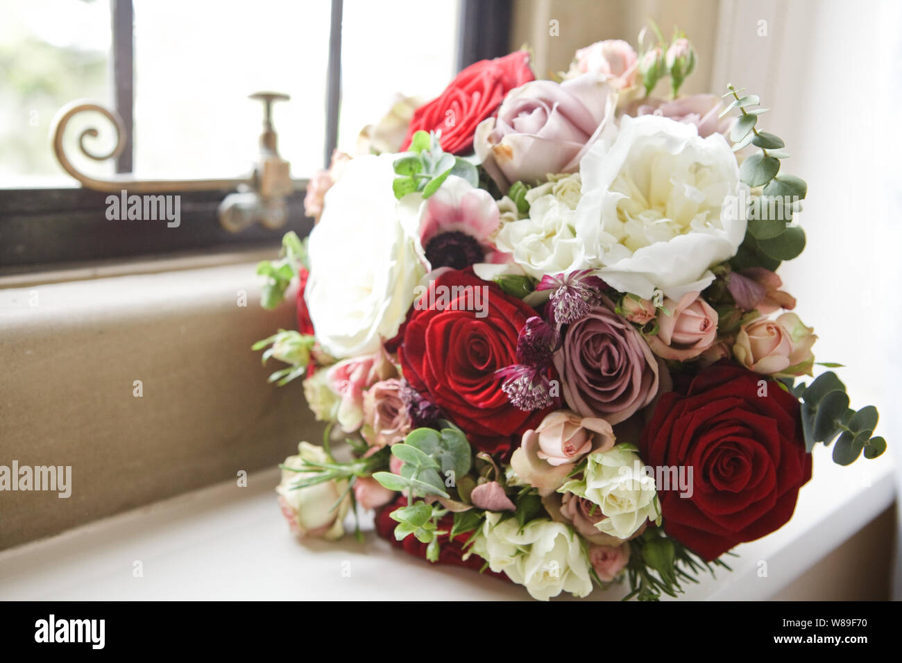 Bridal Bouquet - Red, White & Pink Roses Stock Photo - Alamy