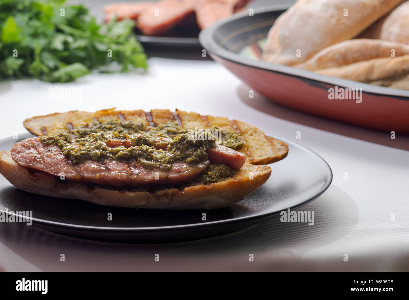 Choripan, south American style chorizo sandwich made with Argentine ...