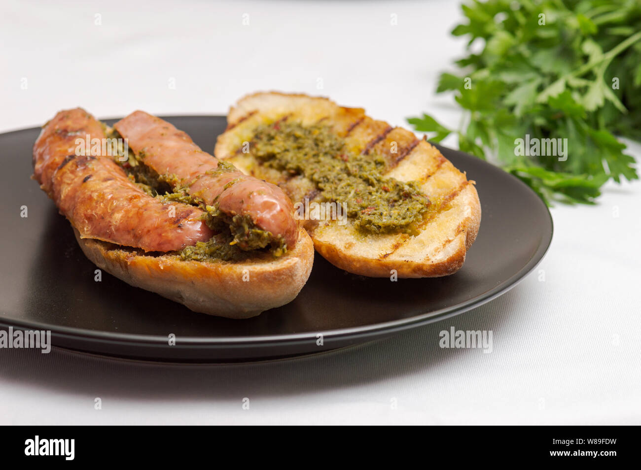 Choripan, south American style chorizo sandwich made with Argentine ...
