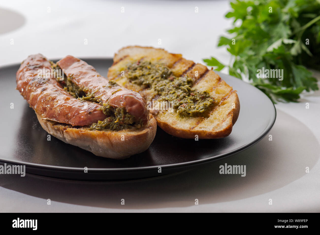 Choripan, south American style chorizo sandwich made with Argentine ...